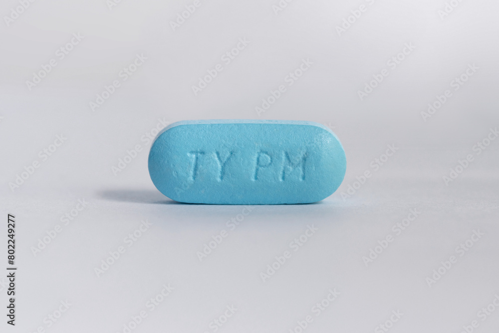 single blue tablet pill of Tylenol PM, pain reliever and sleep aid with ...