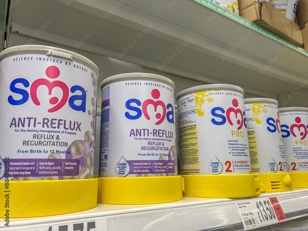 SMA milk powder displayed on the shelves in a supermarket. SMA ...