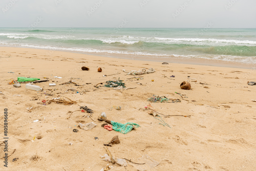 Sri Lanka, Bottles of plastic and garbage on the sand on the beach near ...