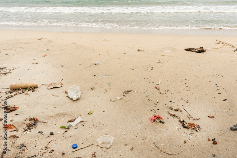 Sri Lanka, Bottles of plastic and garbage on the sand on the beach near ...