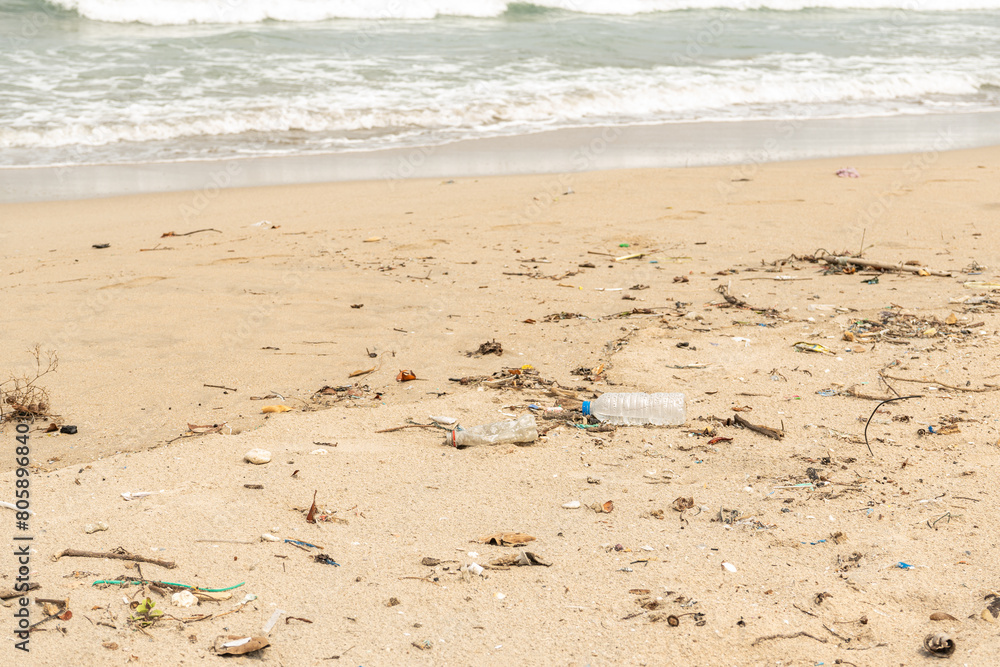 Sri Lanka, Bottles of plastic and garbage on the sand on the beach near ...