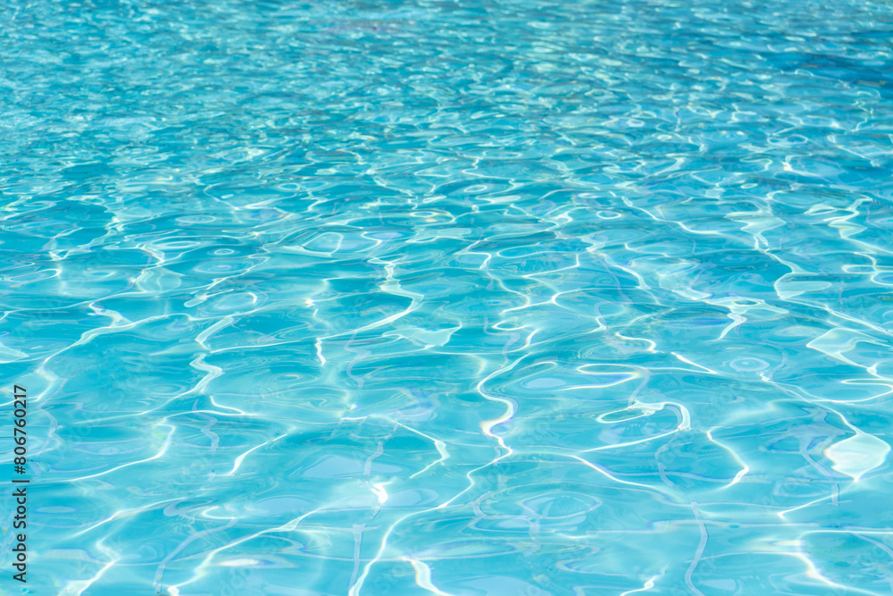 Blue swimming pool water surface and ripple wave background. Summer ...