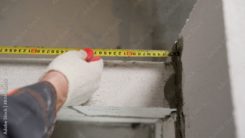 Construction of a partition from blocks inside an apartment. Measuring ...