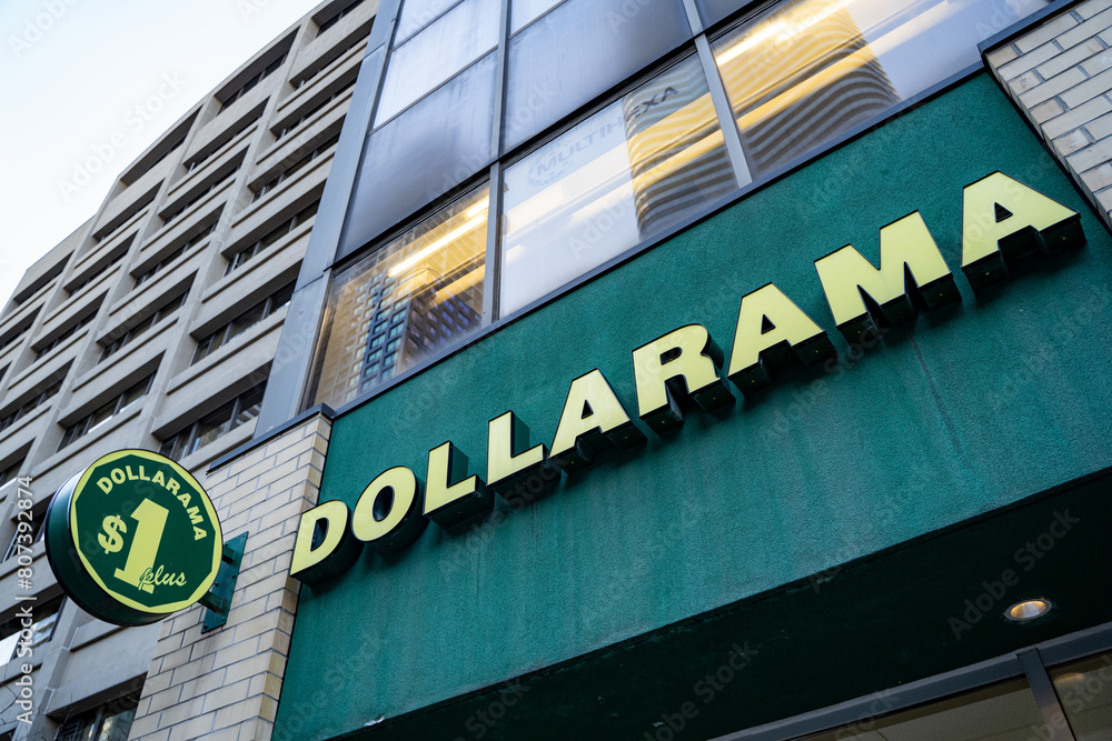 Dollarama logo sign. Dollarama Inc. is a Canadian dollar store retail ...