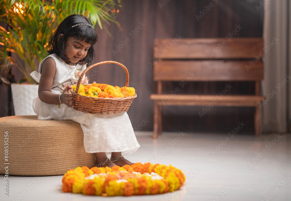 Onam special photo South Indian little girl making Onam pookalam, Cute ...