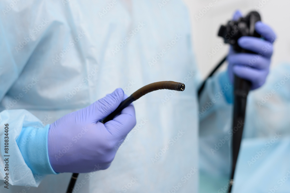 Instruments for diagnostic endoscopy close-up. The doctor holds a ...