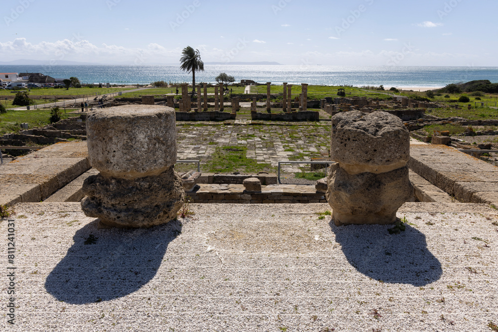 Roman castrum archeological ruins at Baelo Claudia with stone columns ...