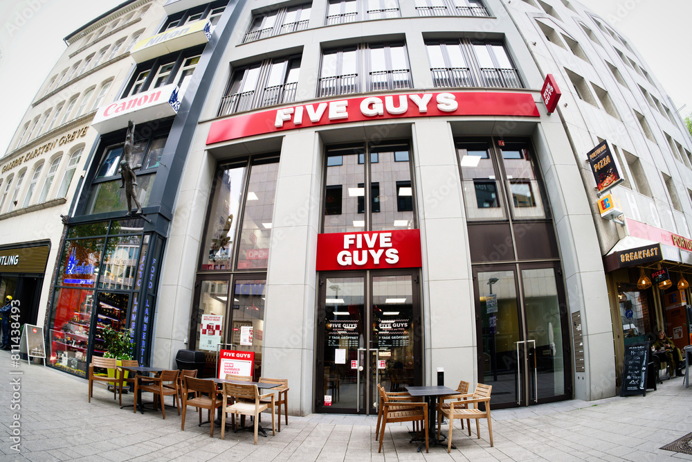 Cologne, Germany May 08 2024: branch of the fast food chain five guys ...