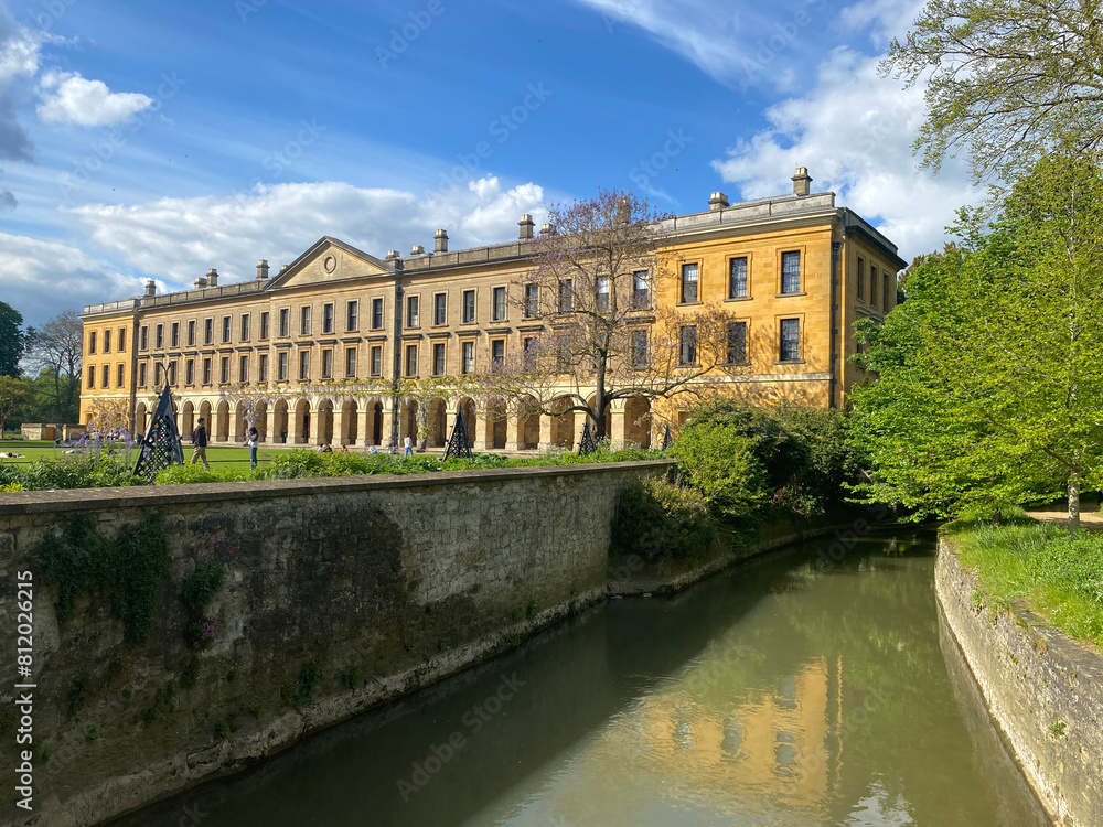 Historic Georgian building with columned arcade along river in Oxford ...