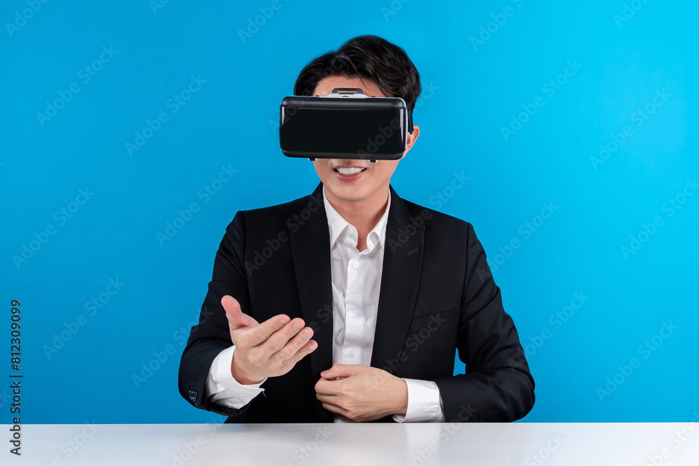 Asian reporter looking thorough VR connecting metaverse explaining ...