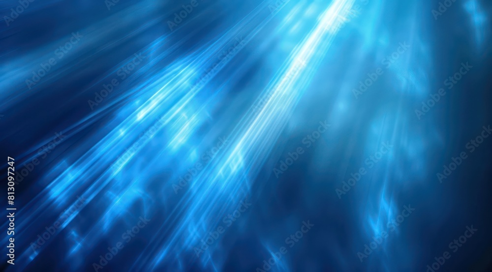 Abstract blue light rays background with glowing bokeh lights and lens ...