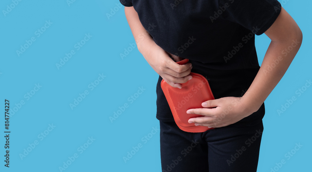 woman has abdominal pain, woman's belly with hot water bottle,Close up ...