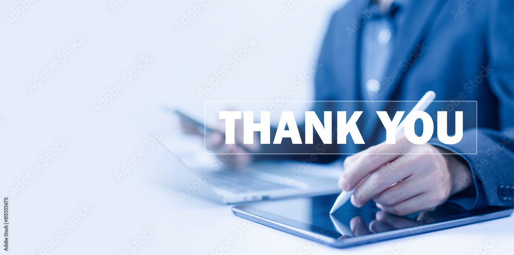 thank you business. businessman using a laptop and showing the message ...