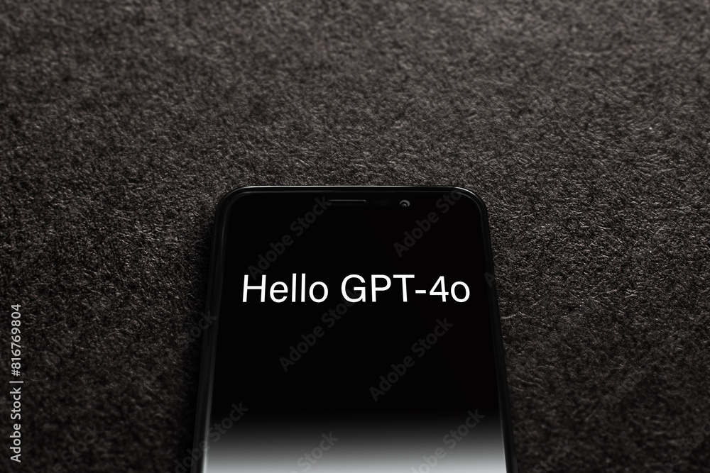 GPT-4o logo on screen smartphone on black textured background ...