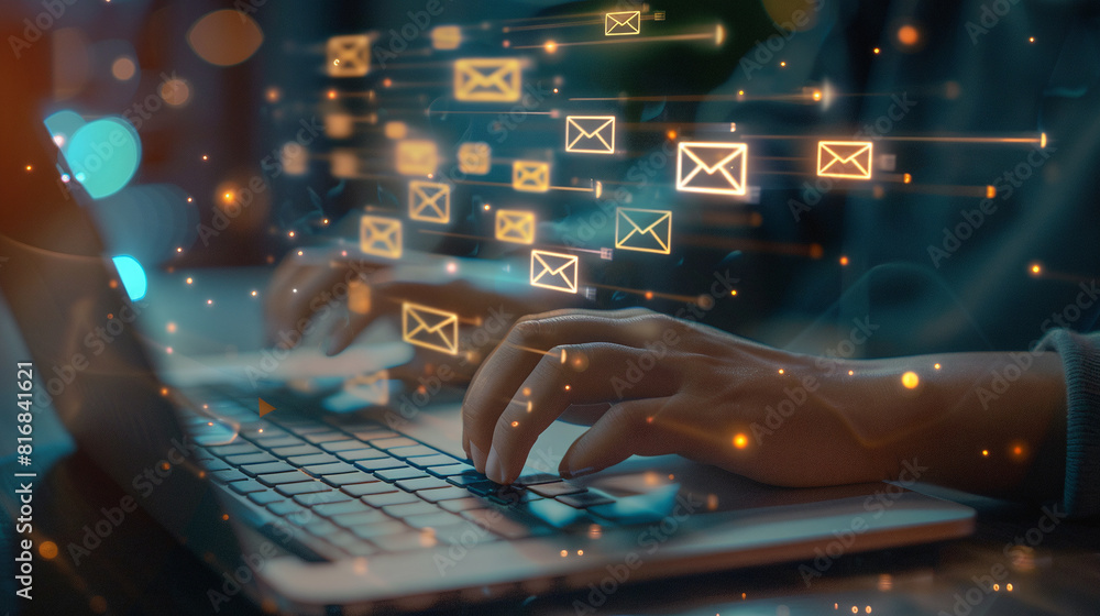 Person types letter on computer. Letter icons are flying around ...