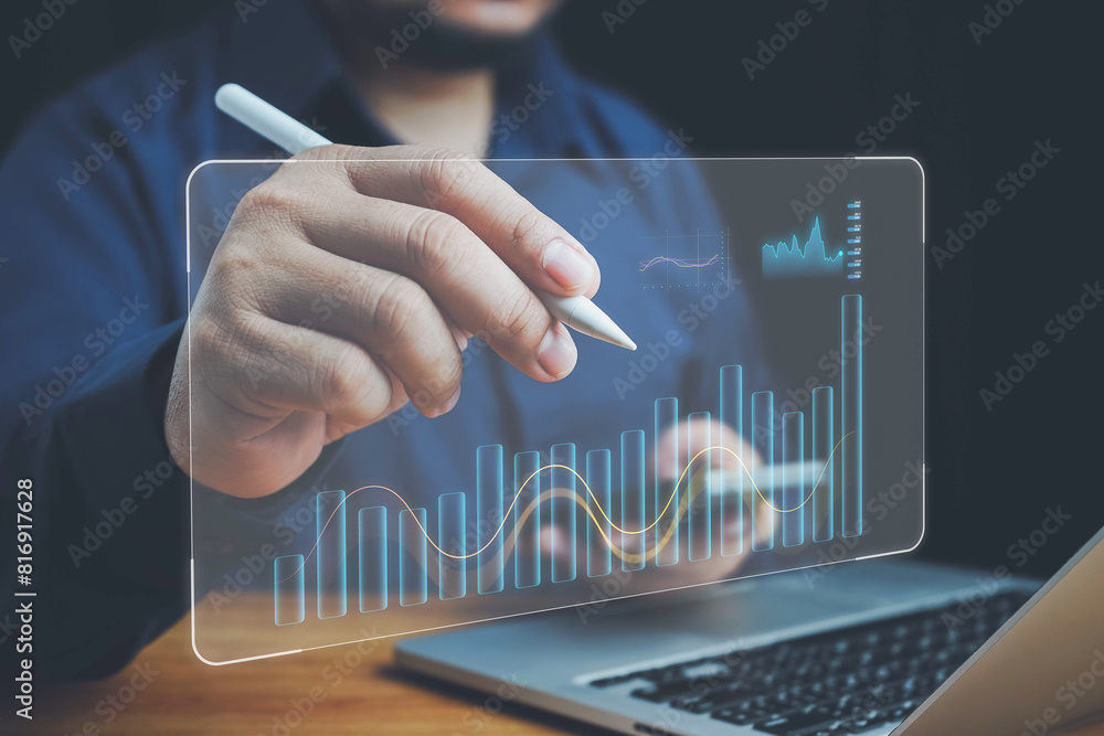 Data analyst working on business analytics dashboard with charts ...
