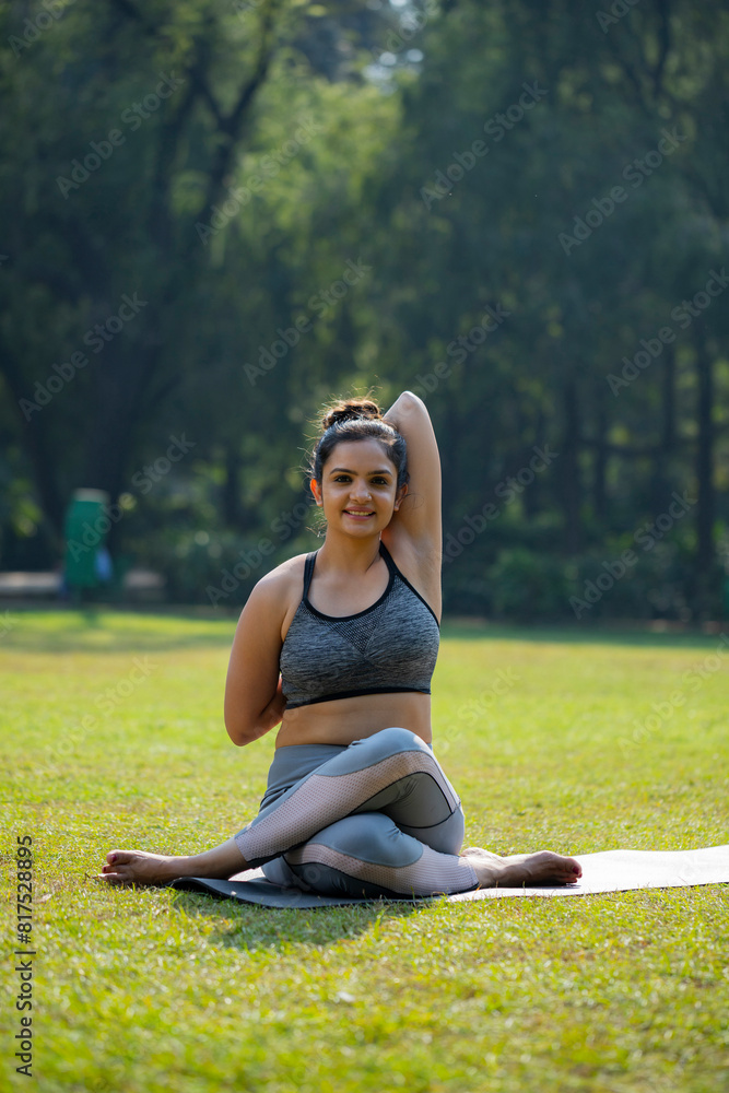 Front View Of A Female Fit Instructor Practicing Gomukhasana Or Cow ...