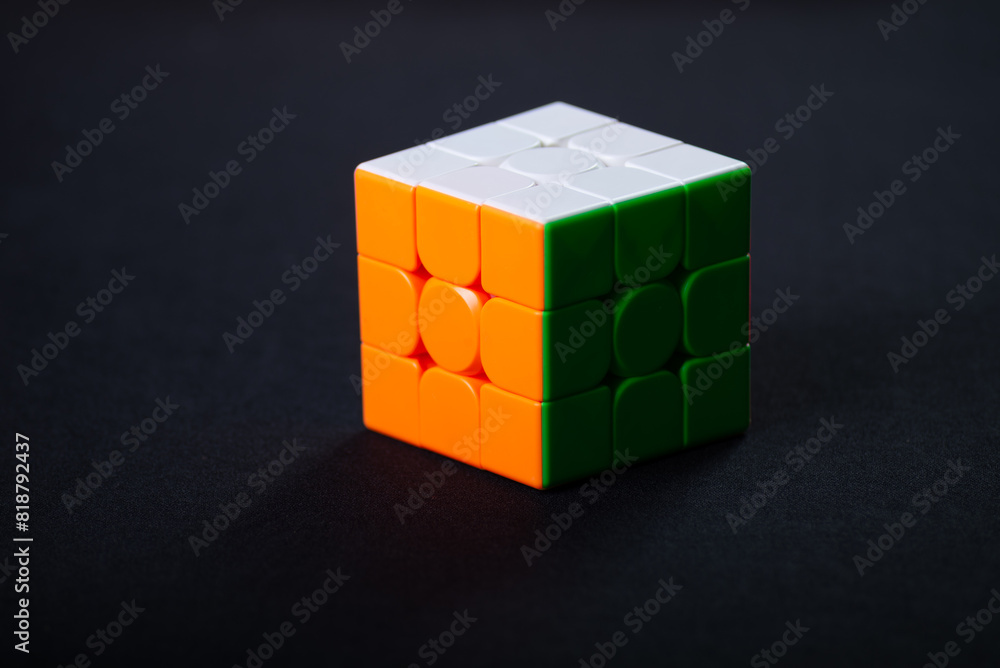 Rubiks Cube on a black background. This famous cube puzzle was invented ...