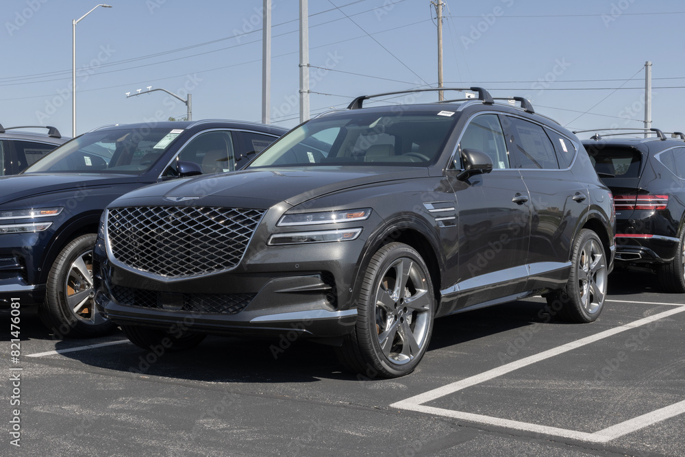 Genesis GV80 2.5T Prestige SUV display. Genesis offers the GV80 2.5T in Base, Advanced, and ...