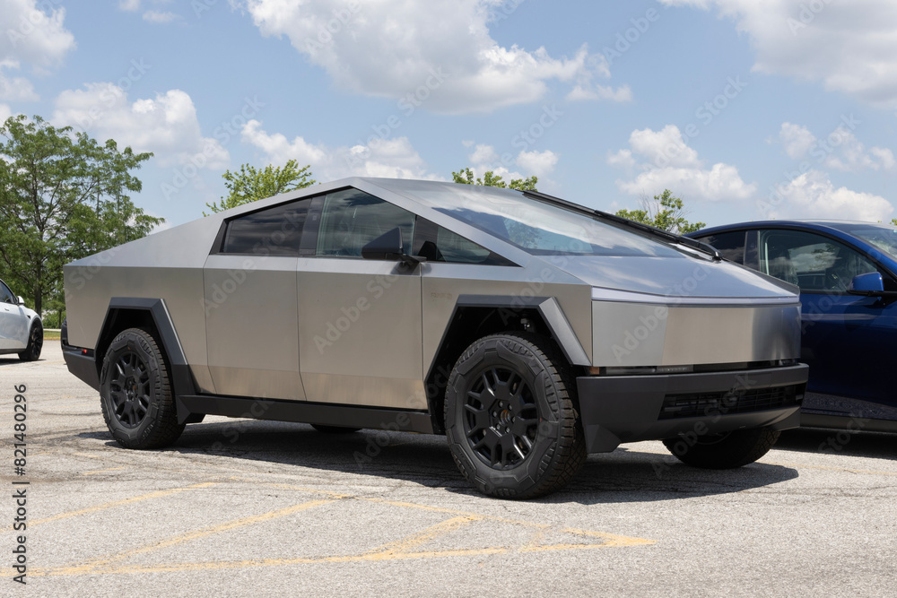 Tesla Cybertruck display at a dealership. Tesla claims the Cybertruck ...