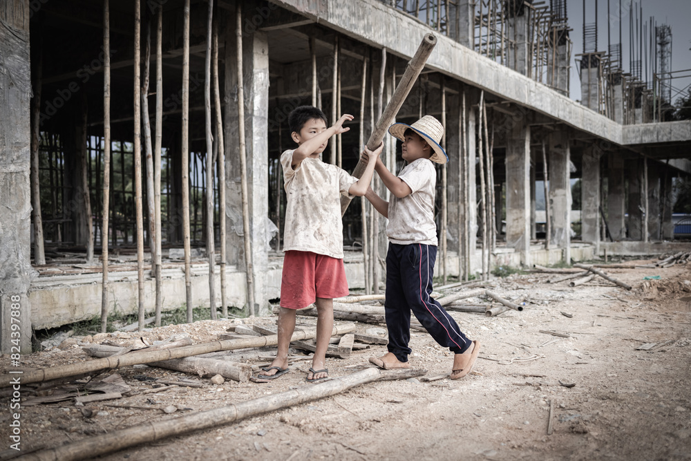 Two poor children are forced to work in construction. Poor children ...
