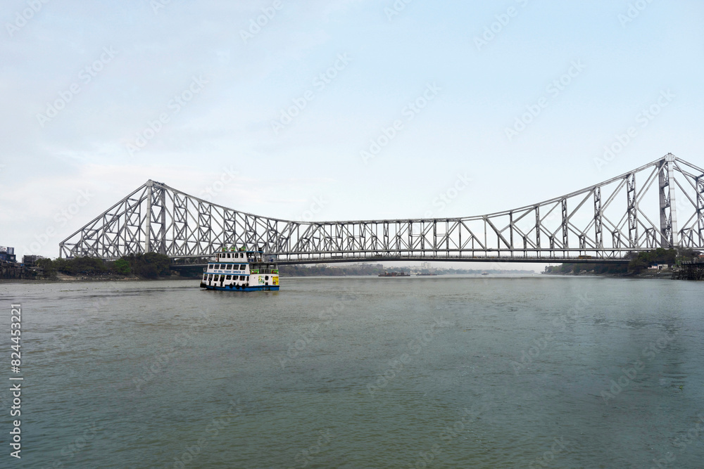 Howrah Bridge, spanning the Hoogli River in Kolkata, West Bengal, is an ... Howrah Bridge, spanning the Hoogli River in Kolkata, West Bengal, is an ...