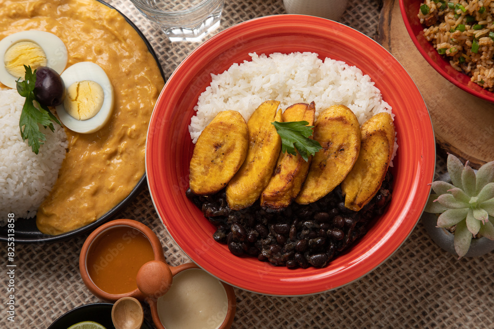 Stock-Foto „Black beans stew stu with fried plantains banana Buffet ...