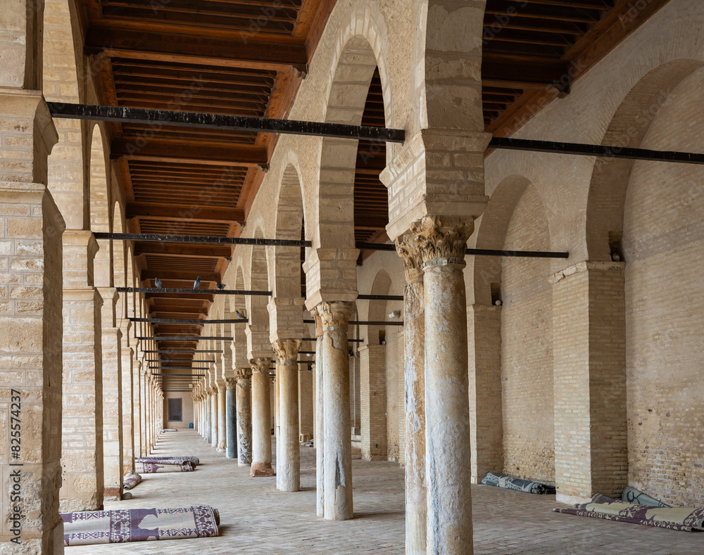 distinctive living arcade with arches supported by Corinthian columns ...
