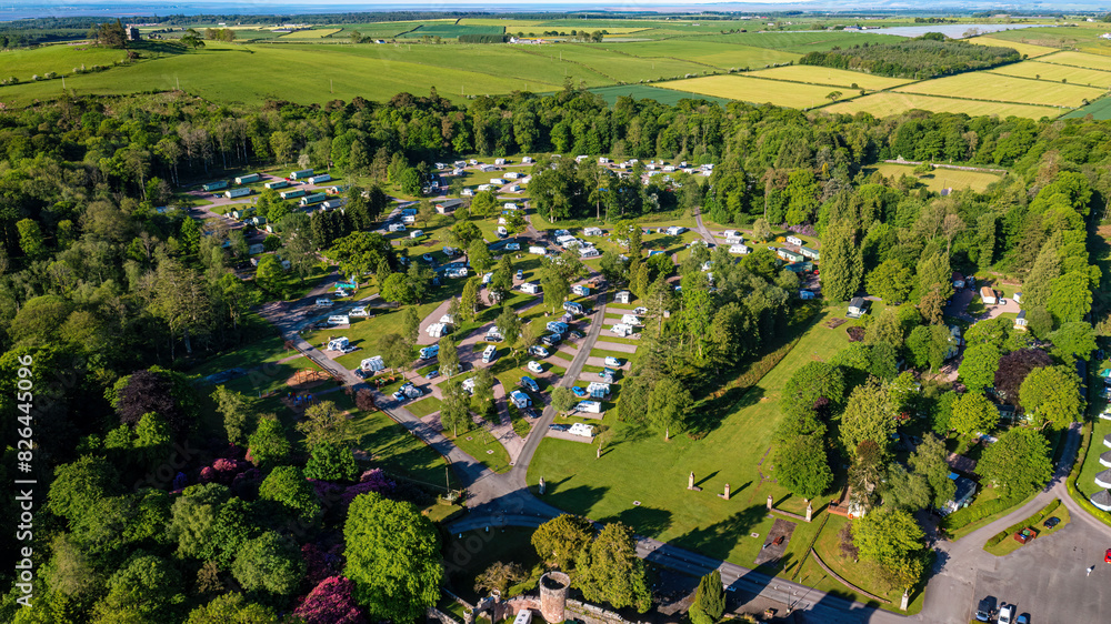 Aerial view of green countryside with village, Hoddom Castle Caravan ...