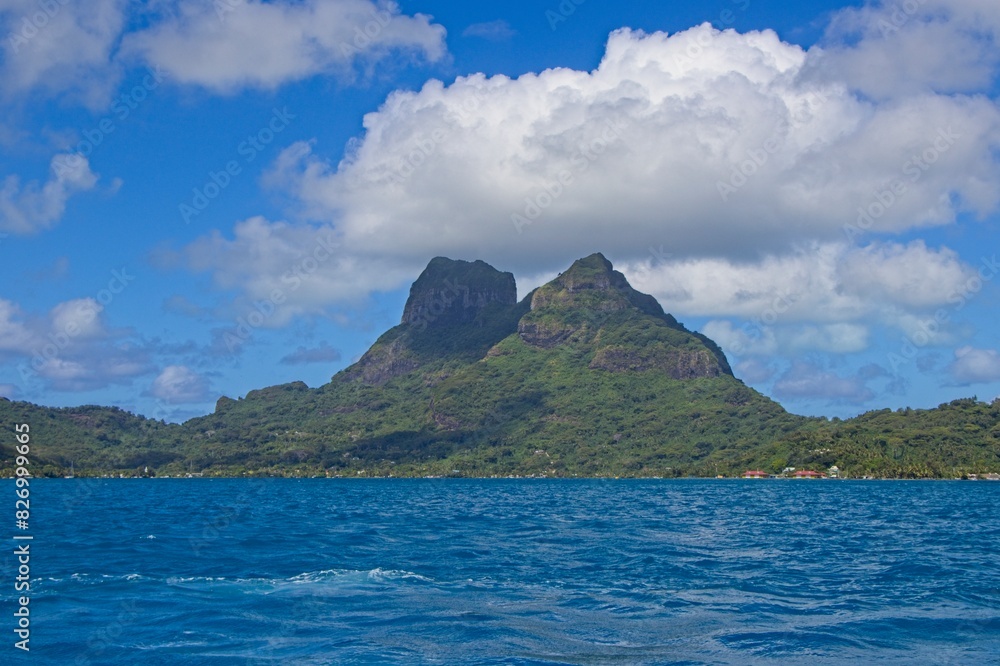 Bora Bora's extinct volcanoes rise above its beautiful lagoon Stock ...