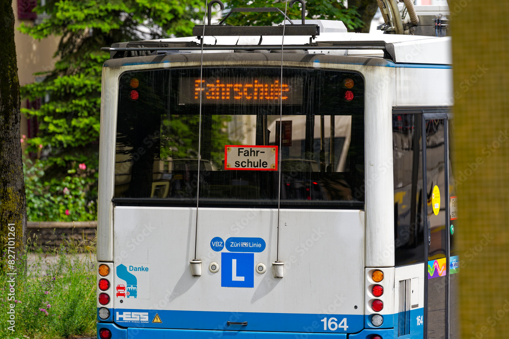 Driving school trolley bus at bus station named Milchbuck at Swiss City ...