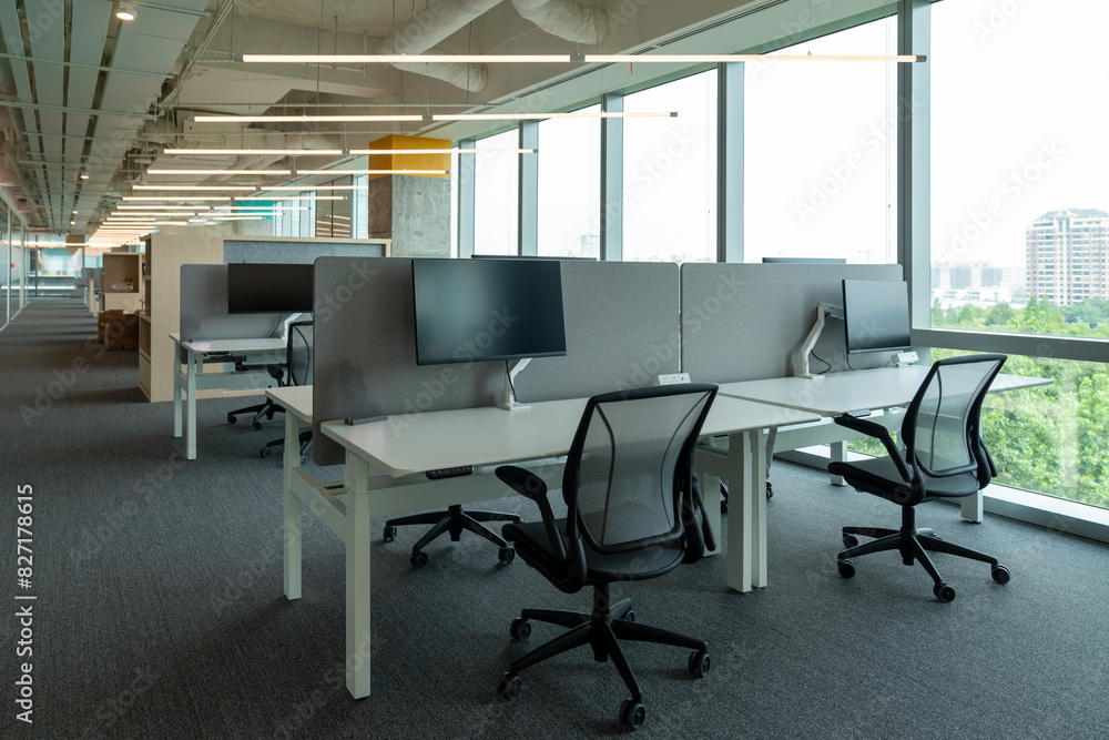 Interior of modern empty office building.Open ceiling design.Equipped ...