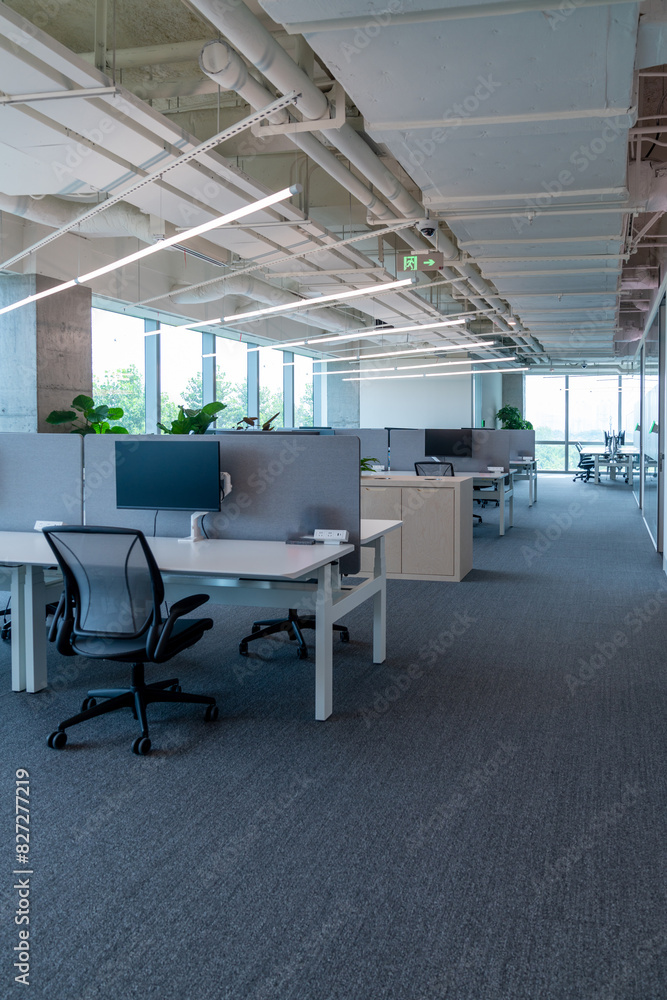 Interior of modern empty office building.Open ceiling design.Equipped ...