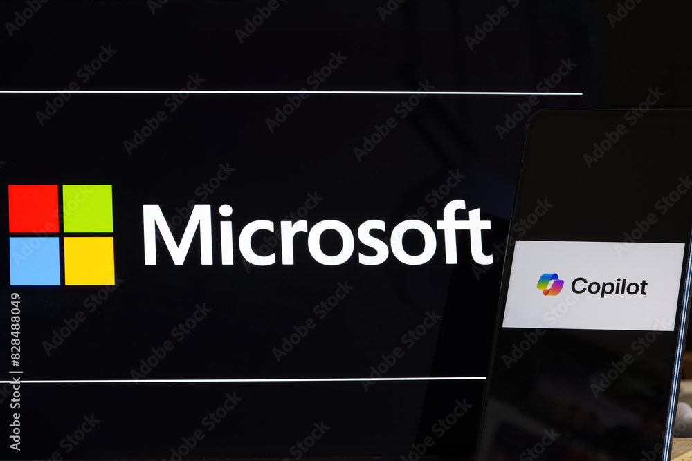 Copilot icon visible on mobile phone screen, Microsoft logo in the ...