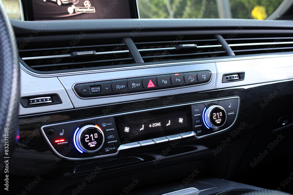 Premium car climate control. Close-up detail with the air conditioning ...