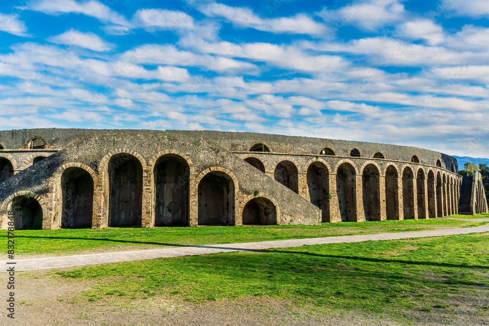 landscape of old ancient building of Roman arena with greeen grass ...
