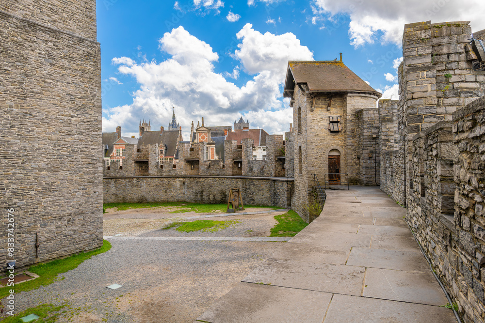 Inside the medieval walls of Gravensteen Castle, with an Interior ...