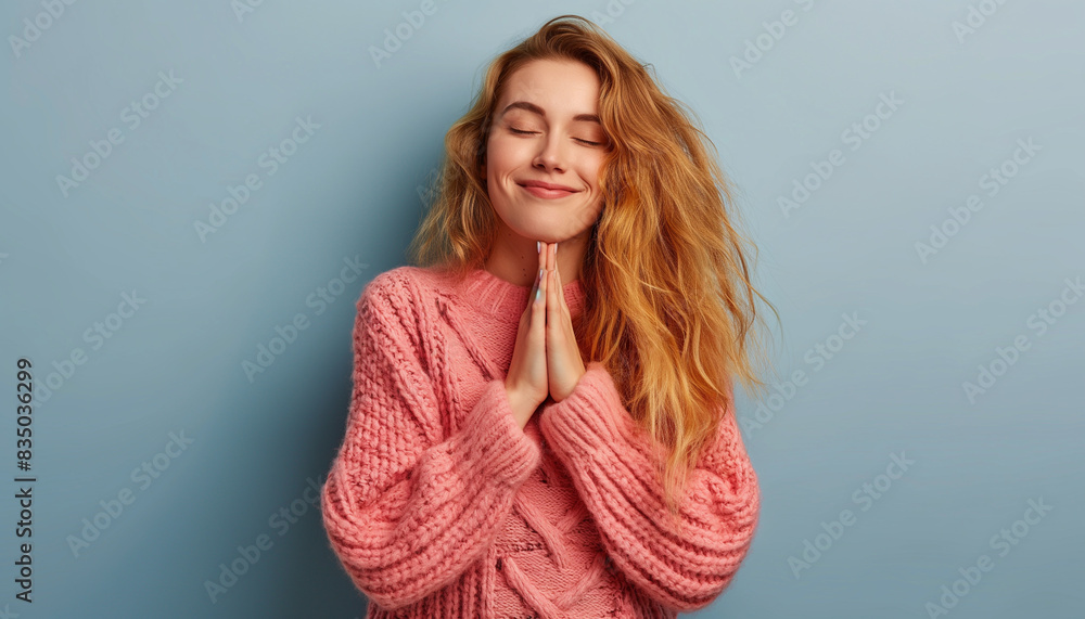 Moment of love and appreciation. Adorable cheerful woman keeps both ...