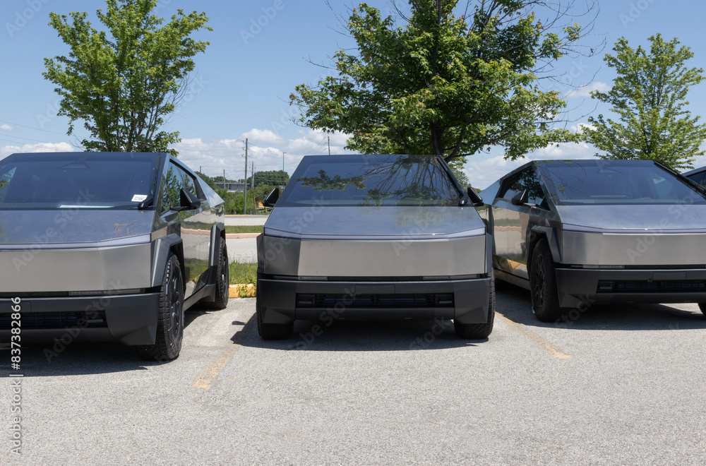 Tesla Cybertruck display at a dealership. Tesla offers the Cybertruck ...