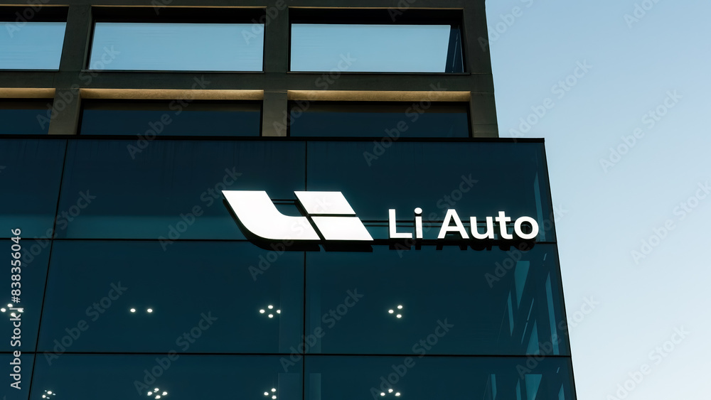 Foto de Stock Li Auto brand logo on car dealership building facade ...