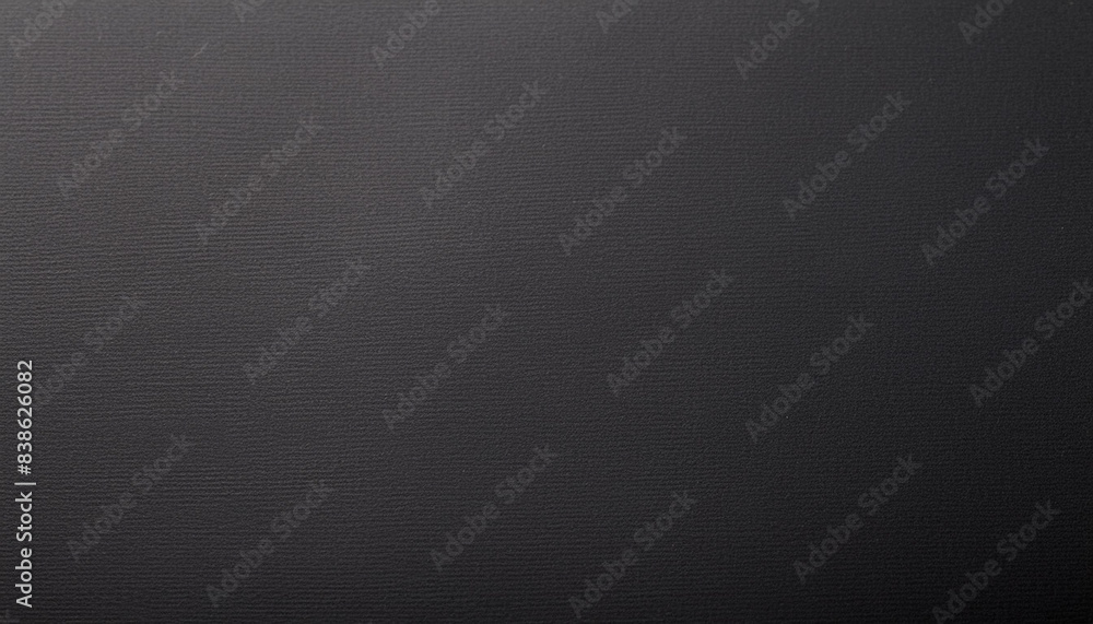 textured black paper sheet close-up, showcasing its matte finish and ...