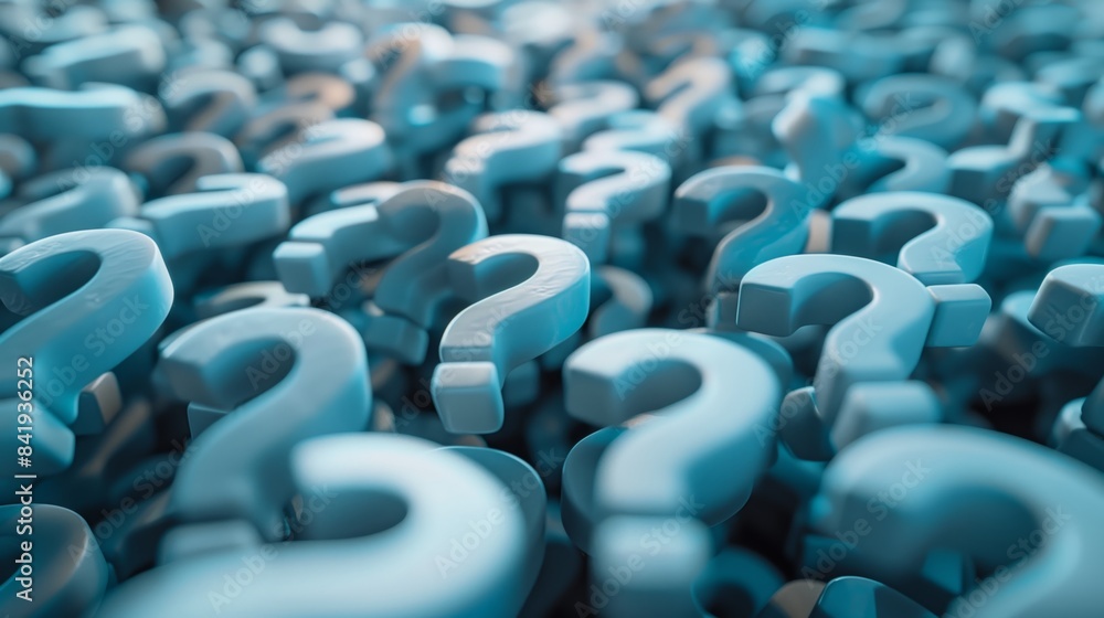 Numerous blue question marks on a blurred background, representing ...