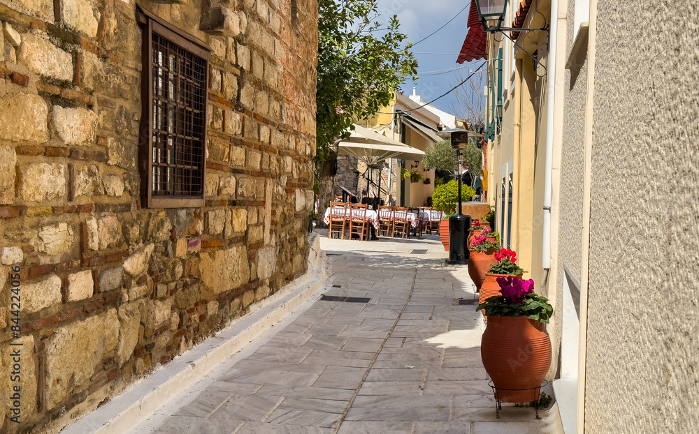 Athens, Greece. Greek open-air tavern empty table and chair at Plaka ...