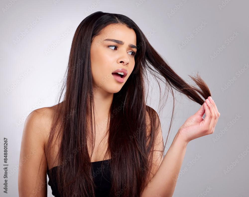 Hair care, problem and woman in studio with worry for frizz, hairstyle ...
