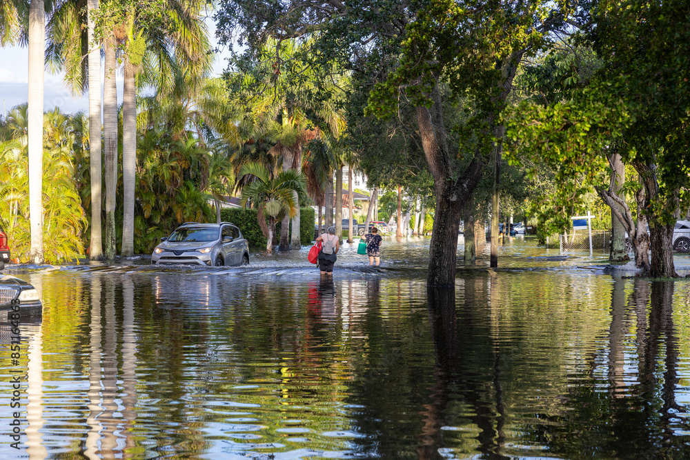 These images show the 2024 Hallandale Beach flood aftermath ...