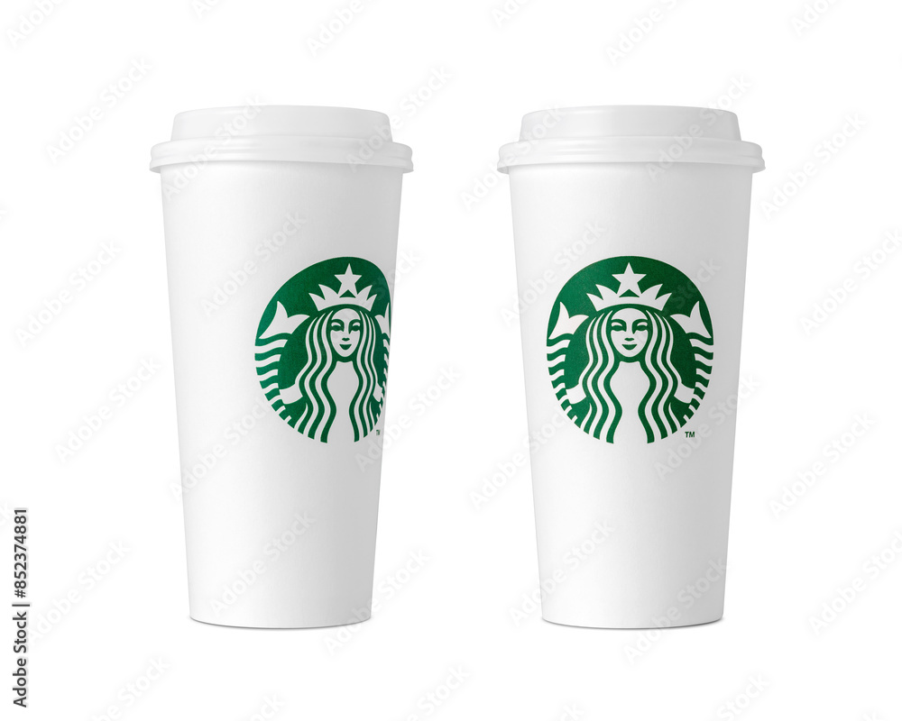 Two tall white Starbucks coffee cups with green mermaid logos and lids ...