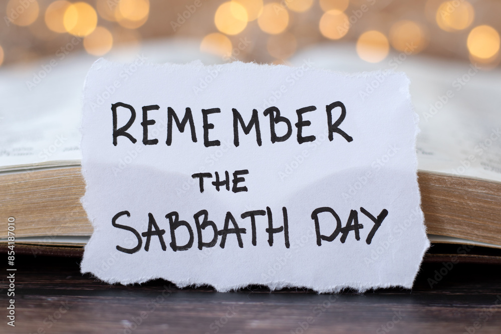 Remember the Sabbath Day, handwritten quote with holy bible book and ...