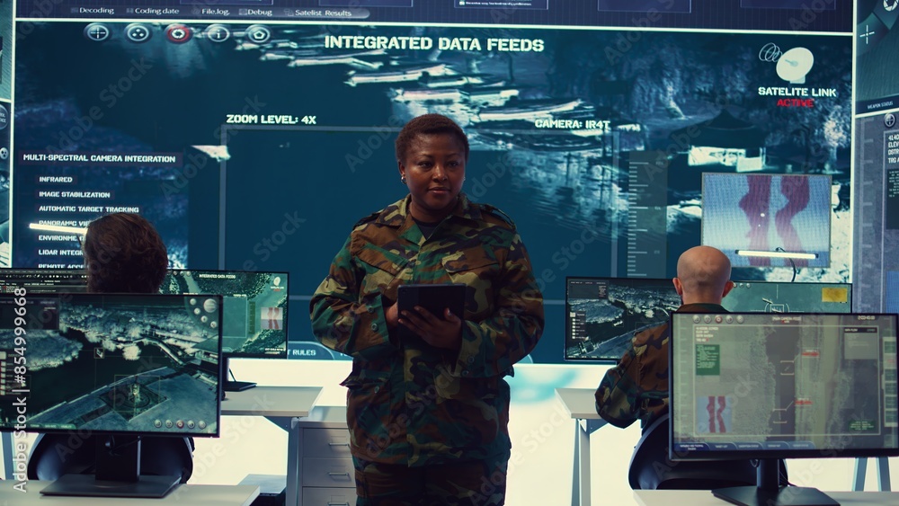 Woman sergeant major working on deployment of electronic warfare tools ...
