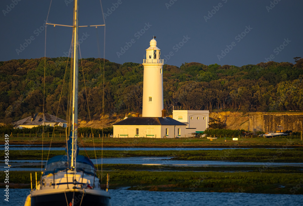 Sunset view of Hurst Point Lighthouse is located at Hurst Point in the ...