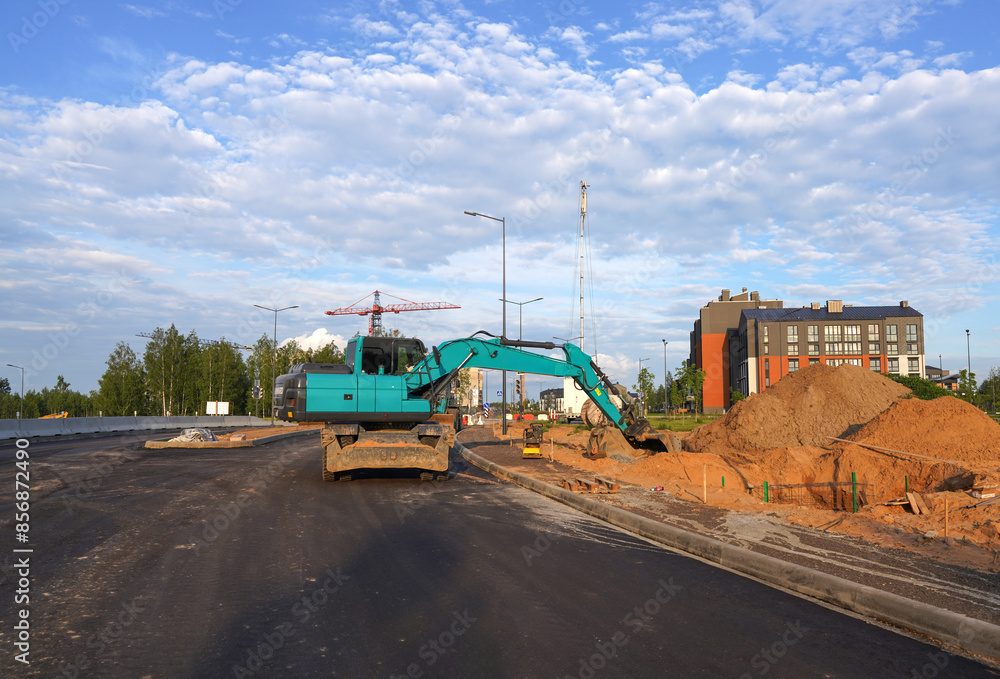 Excavator on groundwork. Backhoe dig ground on Construction site ...